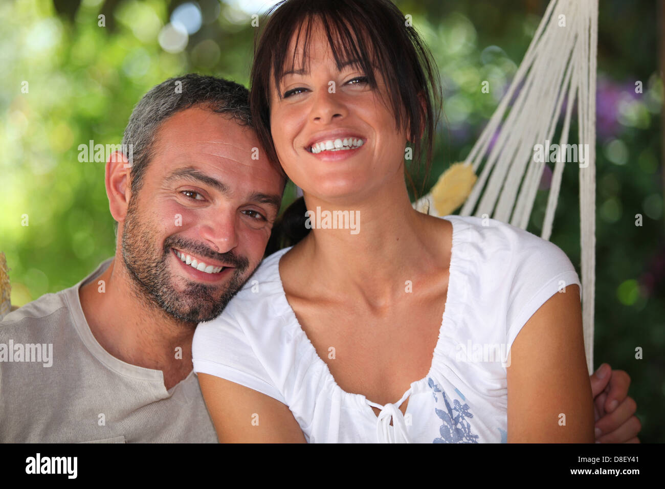 Couple in hammock Stock Photo - Alamy