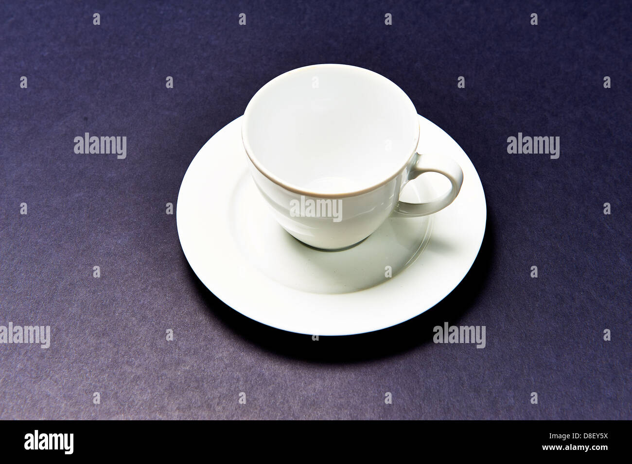 Coffee cup on a dish Stock Photo - Alamy