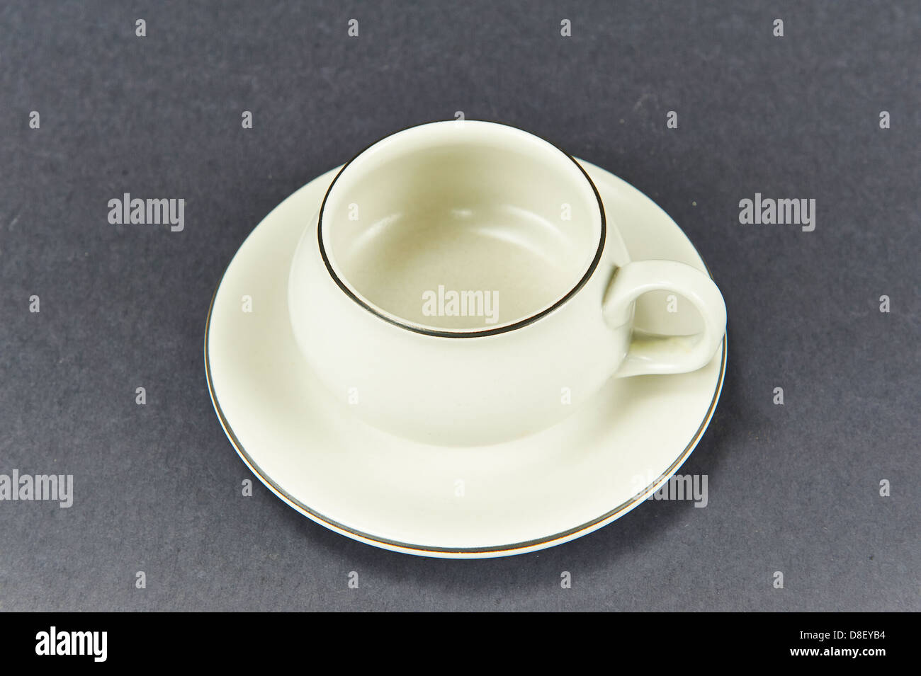 Tea cup on a dish Stock Photo - Alamy
