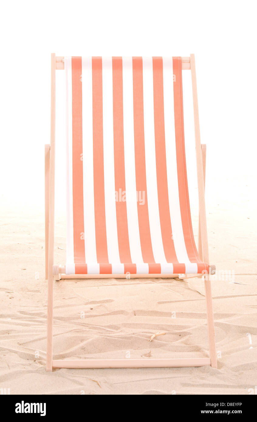 Beach chair in the sand Stock Photo - Alamy