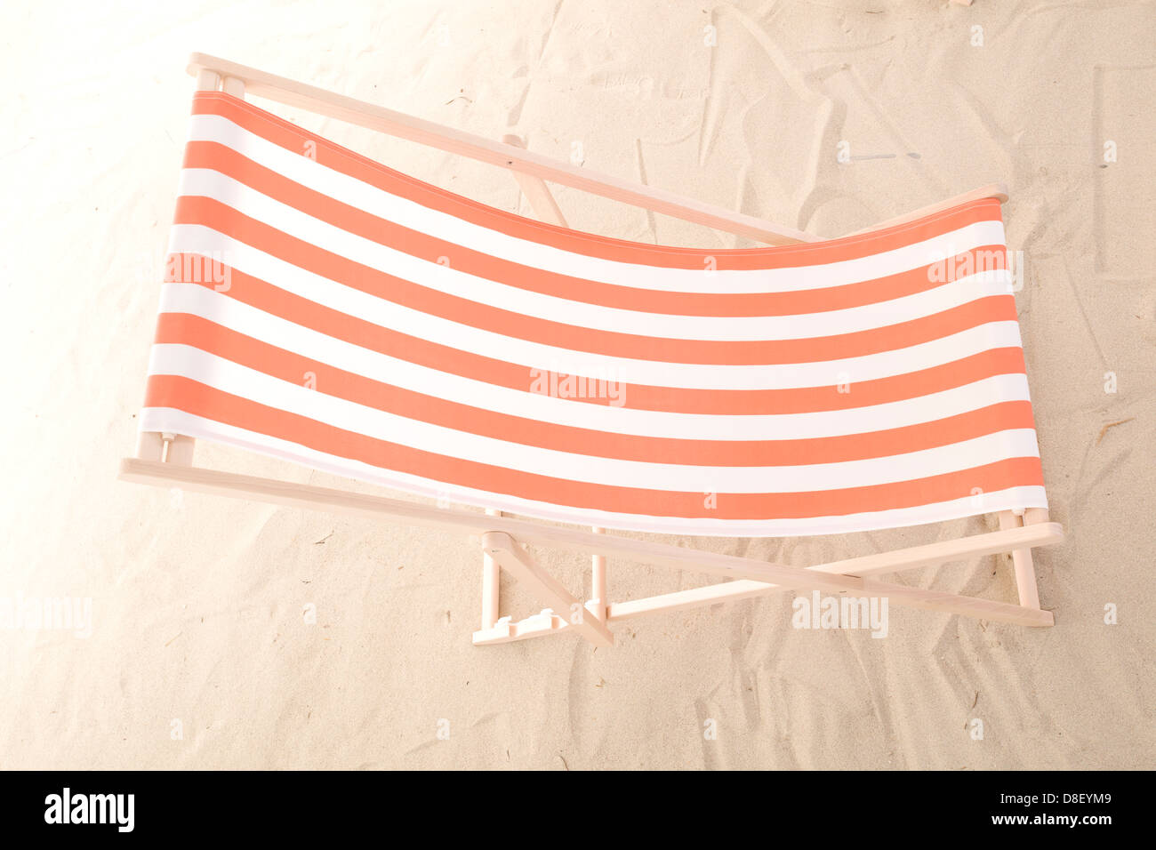 Beach chair in the sand Stock Photo - Alamy