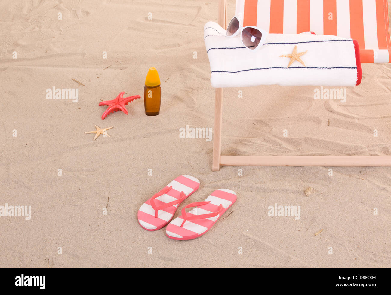 Beach chair in the sand Stock Photo - Alamy