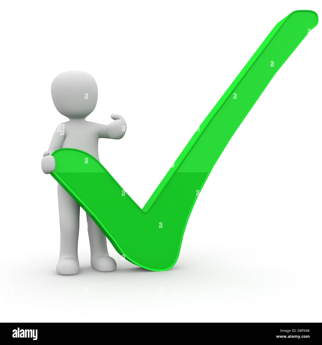A 3d character standing behind a green check mark Stock Photo - Alamy