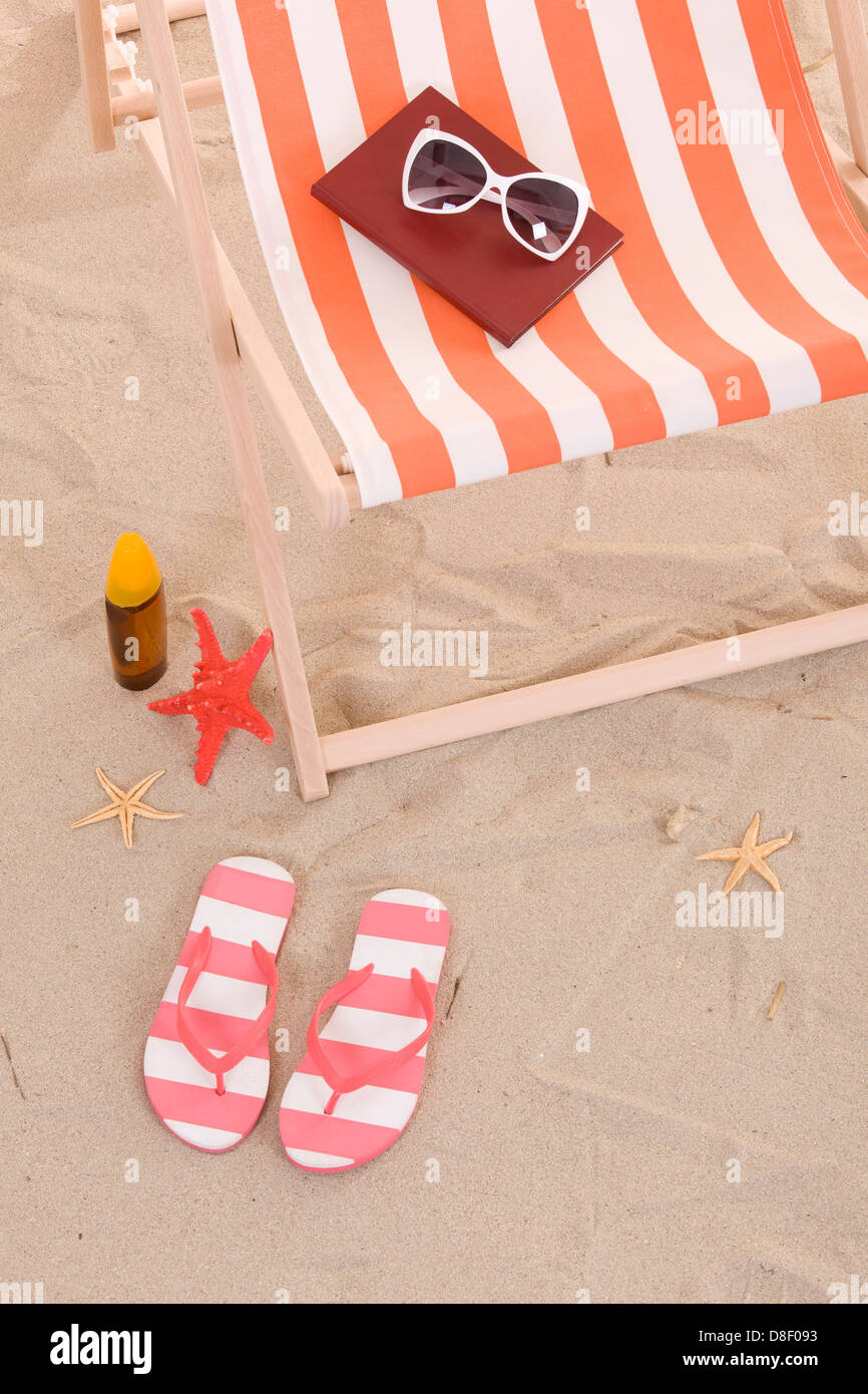 Beach chair in the sand Stock Photo - Alamy