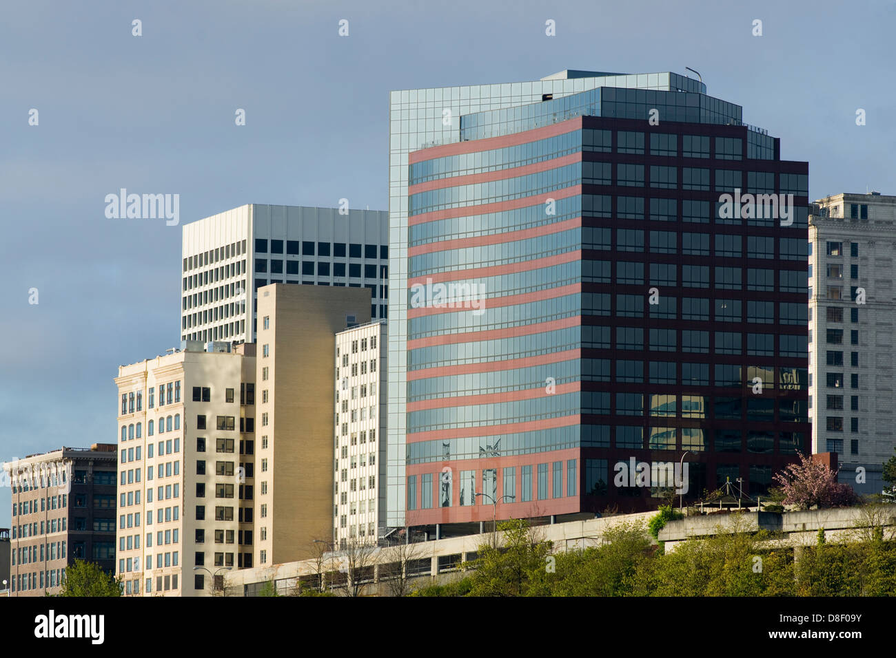 The sun rises hitting the buildings of Downtown Tacoma Washington ...