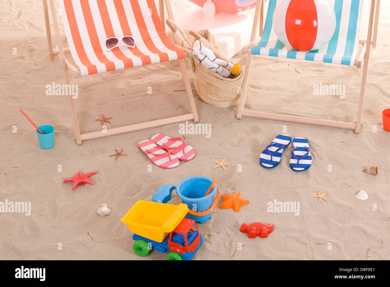 Beach chair in the sand Stock Photo - Alamy