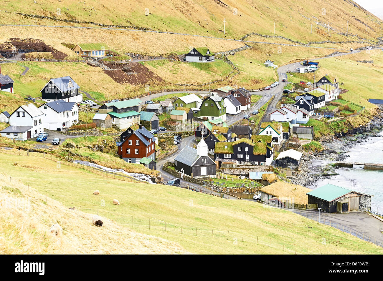 Small village with small church Stock Photo - Alamy