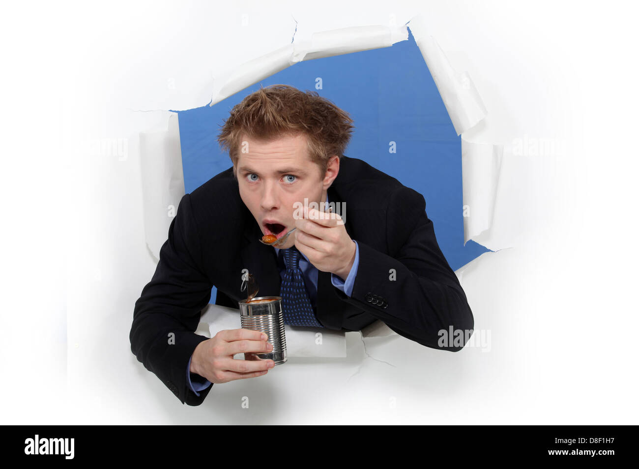 Man eating baked beans from a can hi-res stock photography and images ...
