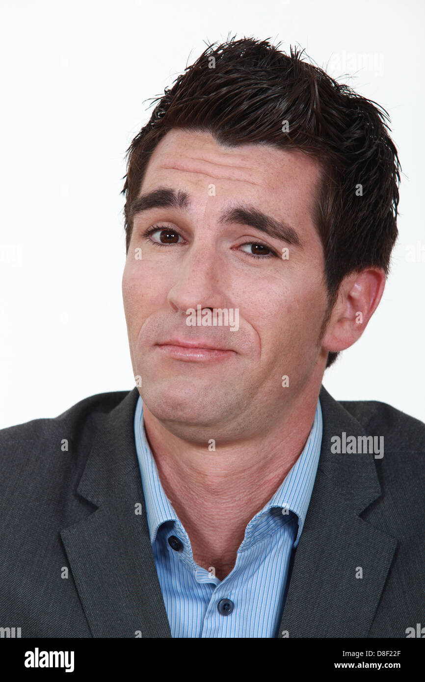 Portrait of a doubtful man Stock Photo - Alamy