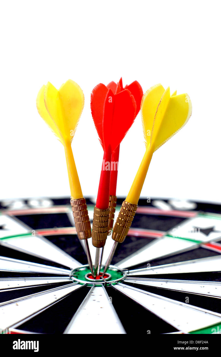 Dartboard with 4 darts Stock Photo - Alamy