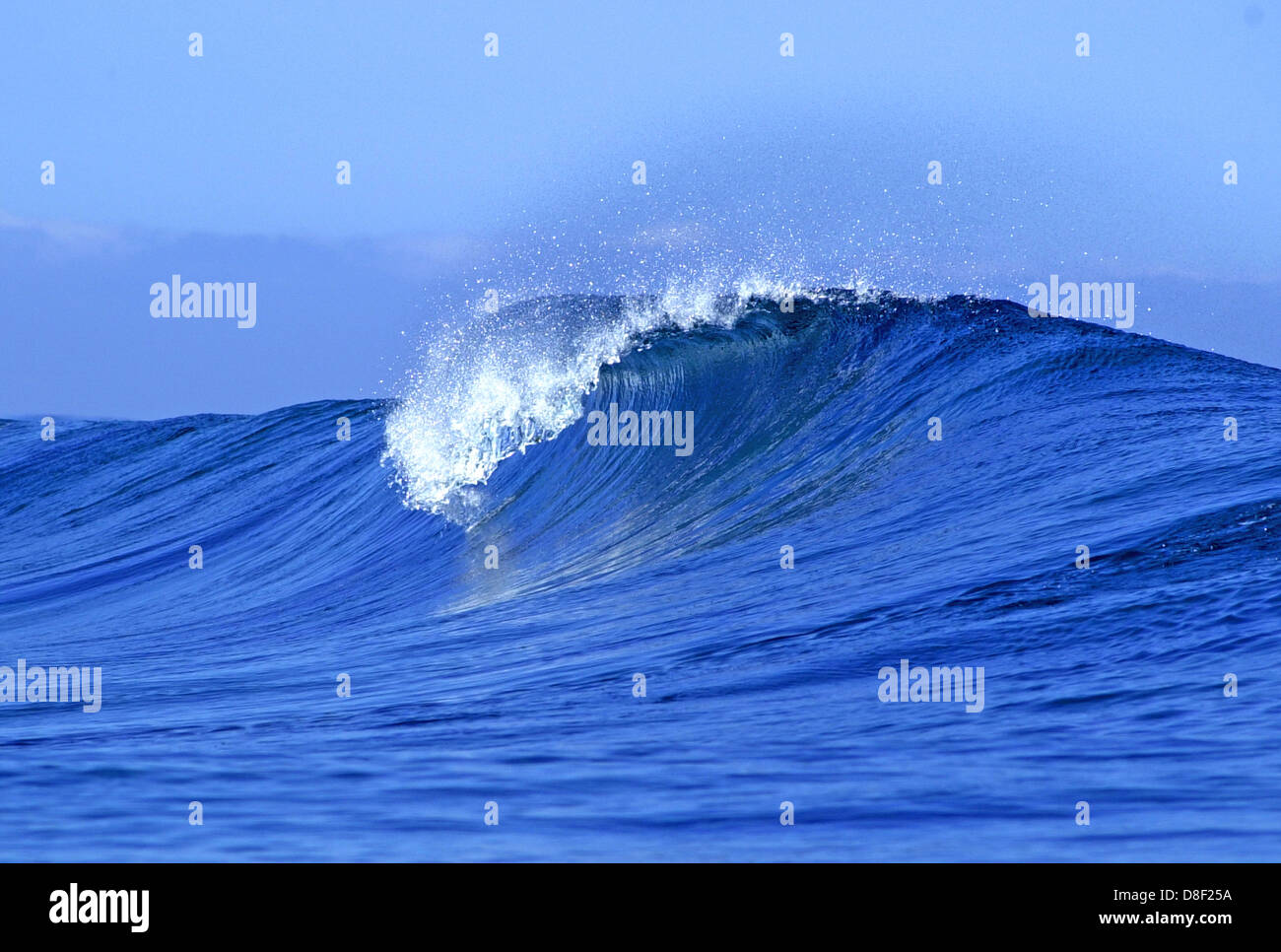 A view of a scenic blue ocean wave in Fiji Stock Photo - Alamy