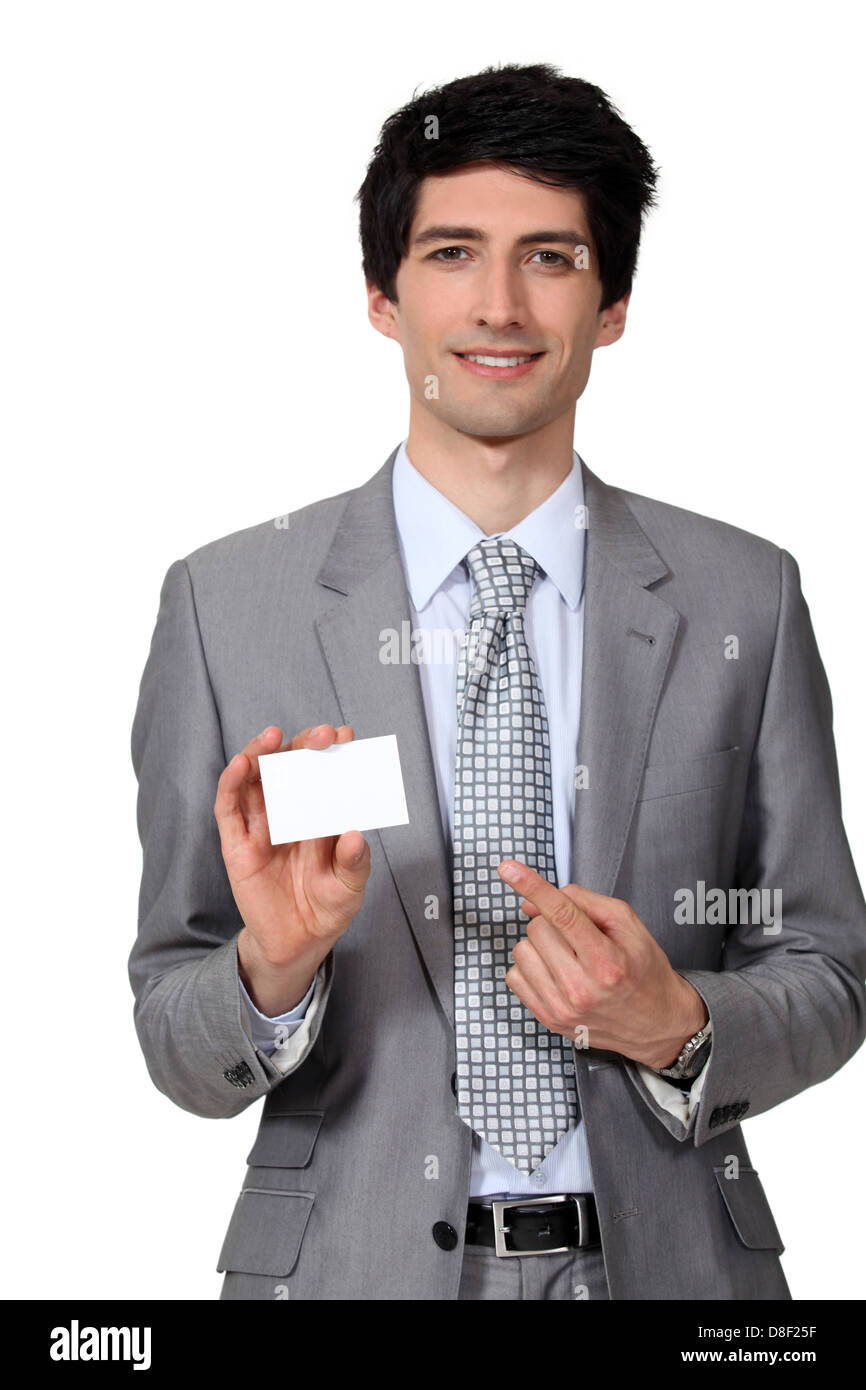 Executive with business card Stock Photo - Alamy