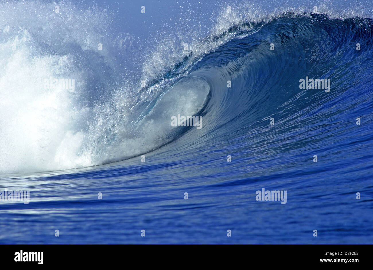Tropical wave barrel in the ocean in Fiji Stock Photo - Alamy