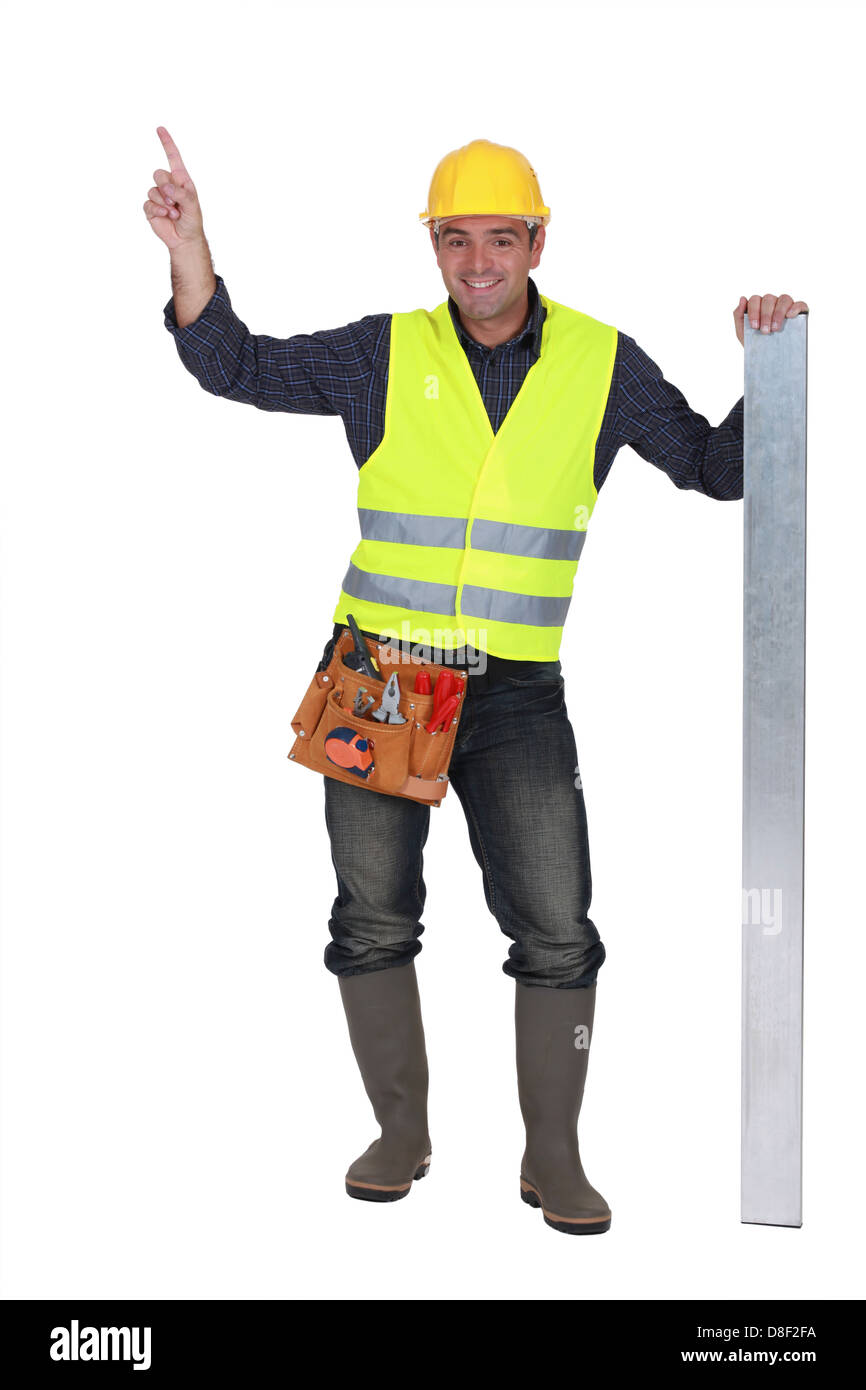 Construction worker pointing Stock Photo - Alamy