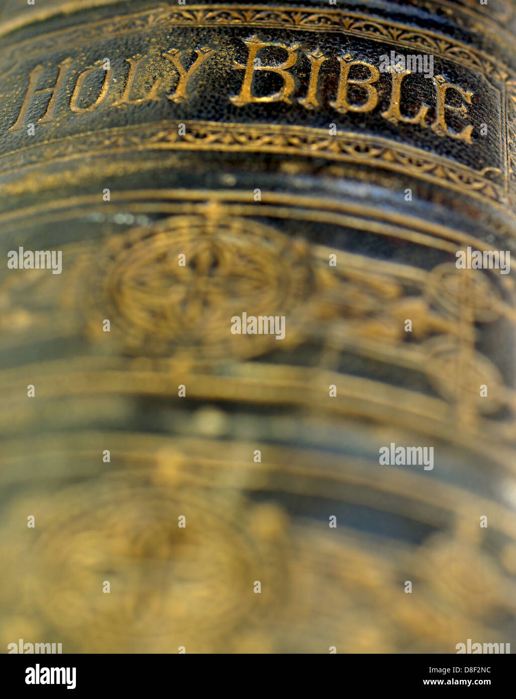 Spine of an old ancient holy bible Stock Photo - Alamy