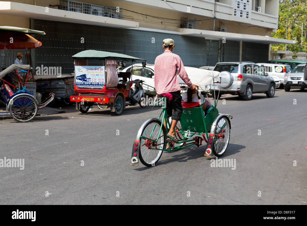 Rickshaw Driver in Phnom Penh, Cambodia Stock Photo - Alamy