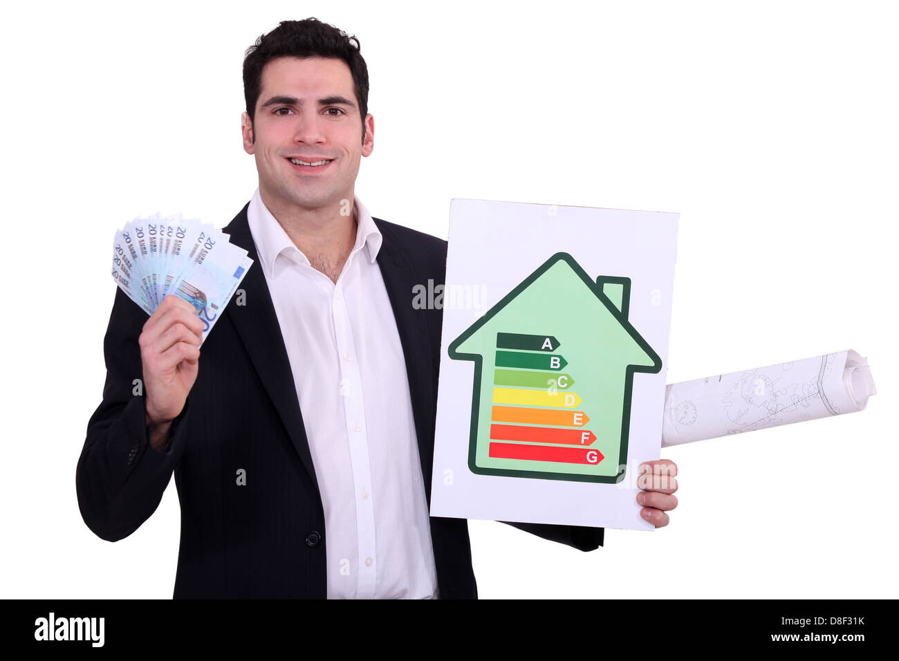 Man holding money and energy efficiency poster Stock Photo - Alamy