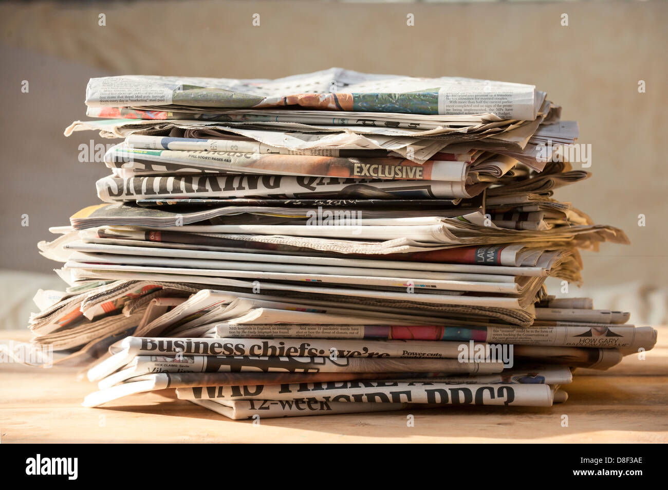 Stack of newspapers Stock Photo - Alamy