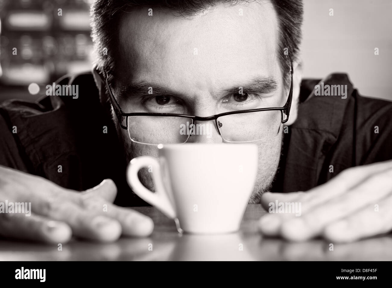 Sommelier Examining Coffee Cream In Espresso Cup Stock Photo - Alamy