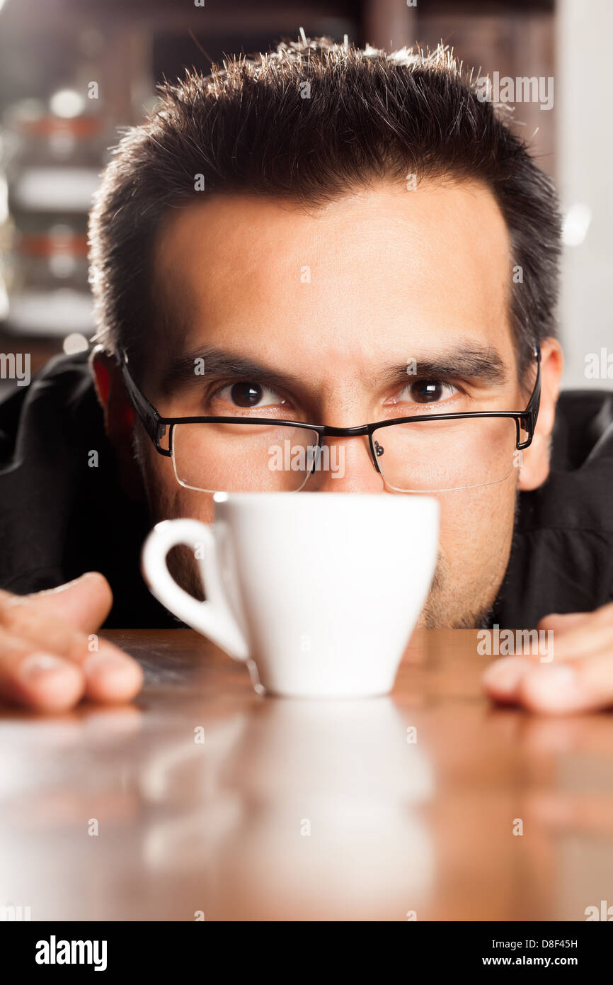 Sommelier Examining Coffee Cream In Espresso Cup Stock Photo - Alamy