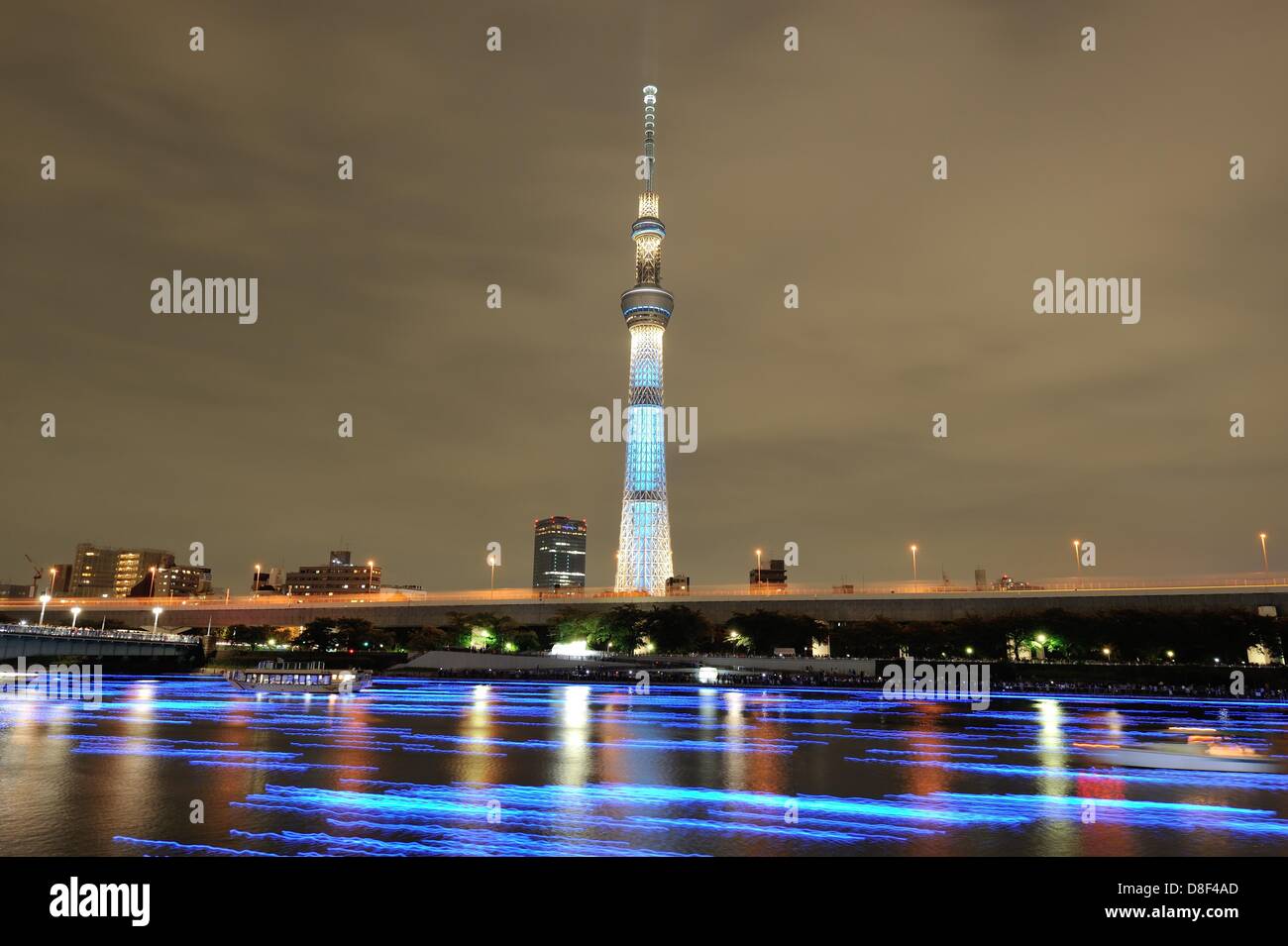 May 25, 2013, Tokyo, Japan - Some 100,000 blue LED light bulbs floats ...
