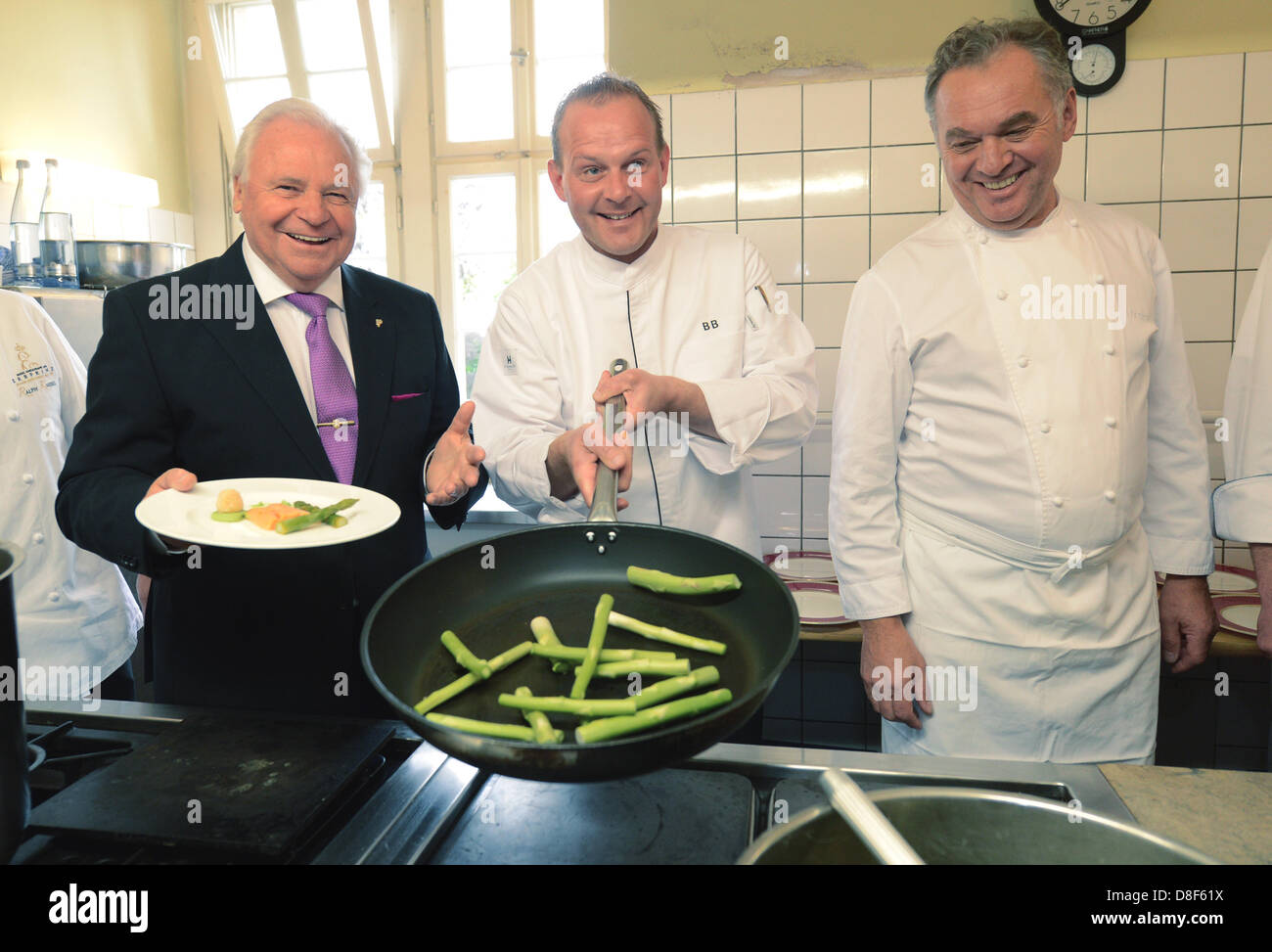 Chefs Eckart Witzigmann, Boris Benecke and Karl Ederer prepare a menu ...