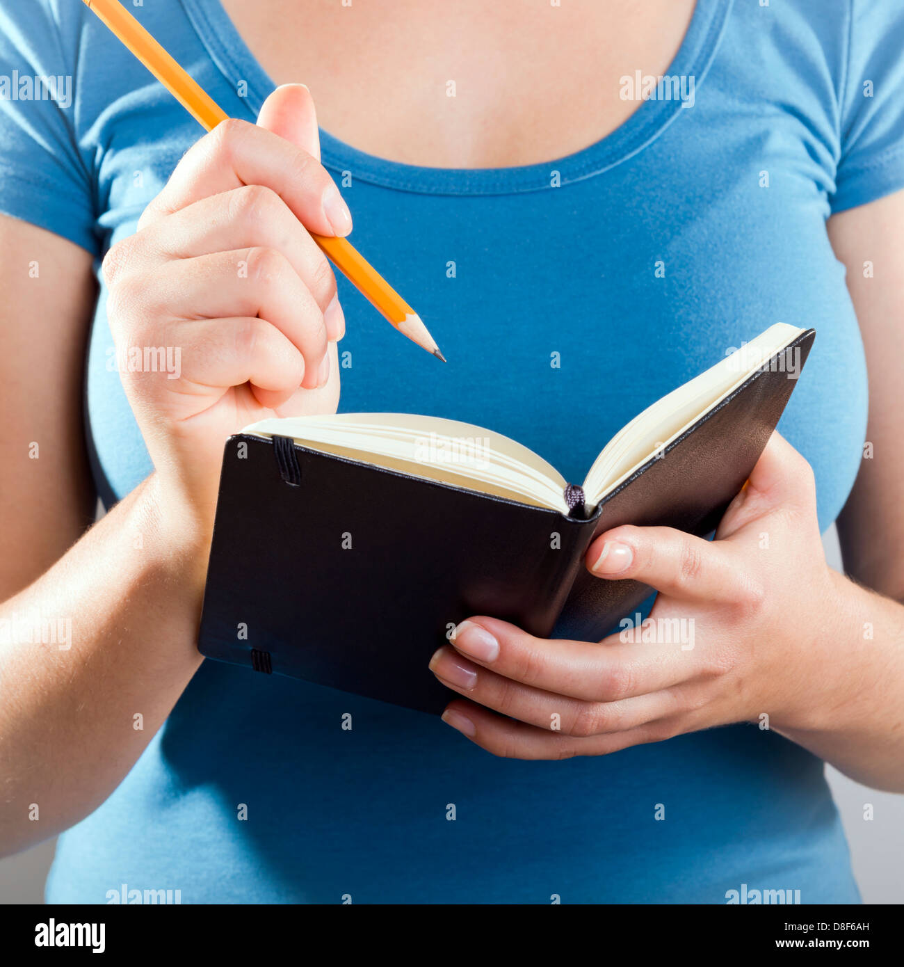 Black child writing with pencil hi-res stock photography and images - Alamy