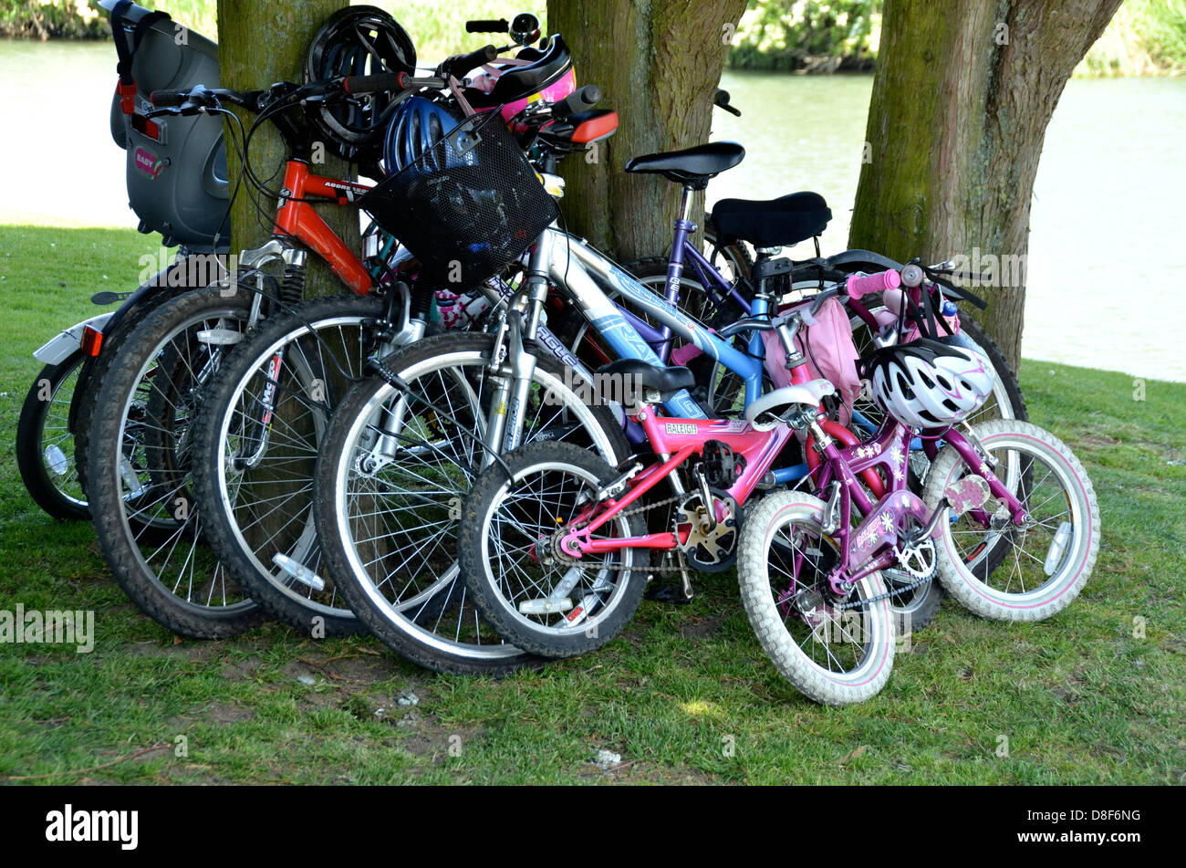 Row of bicycles, large and small Stock Photo - Alamy