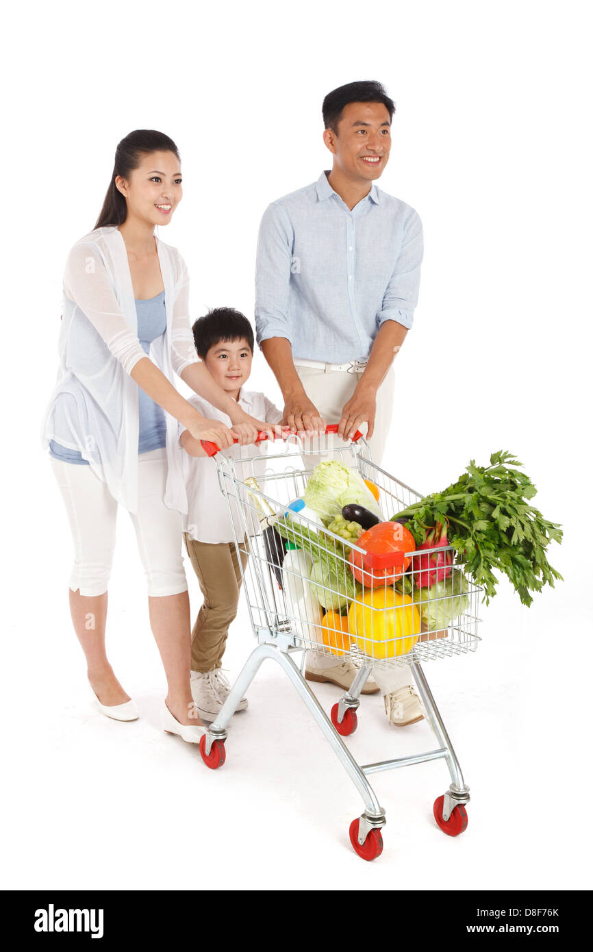 Family shopping with shopping cart Stock Photo - Alamy