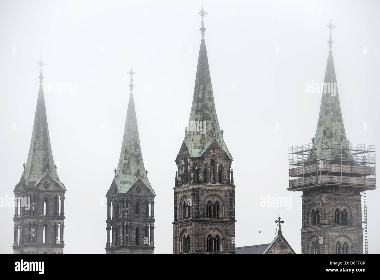 the-four-spires-of-the-cathedral-protrude-form-the-fog-in-bamberg ...