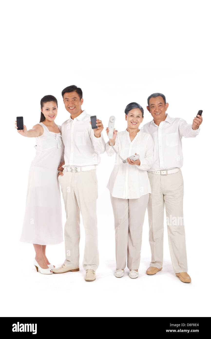 Whole family making phone call Stock Photo - Alamy