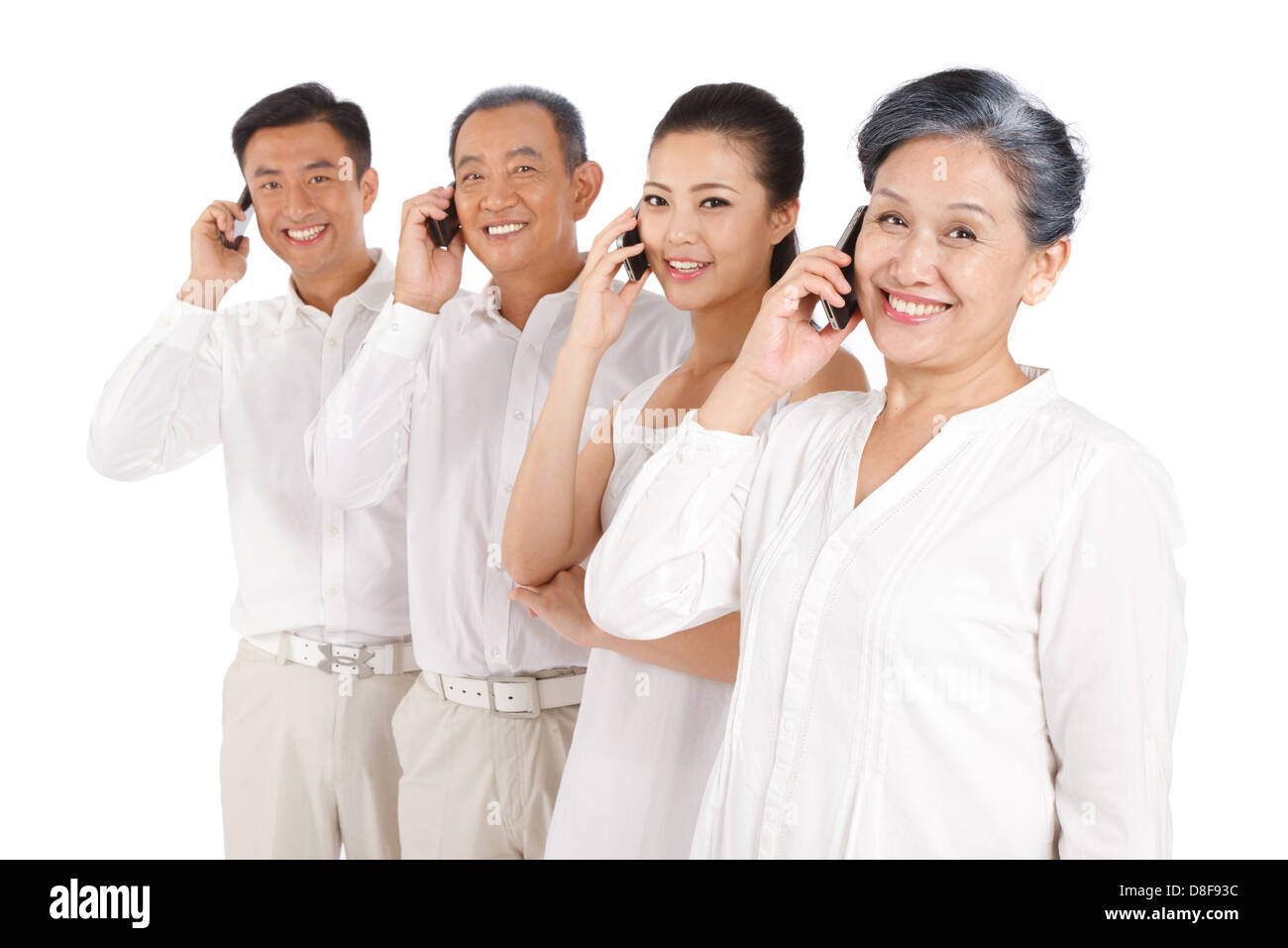 Young couple and old couple making phone call Stock Photo - Alamy