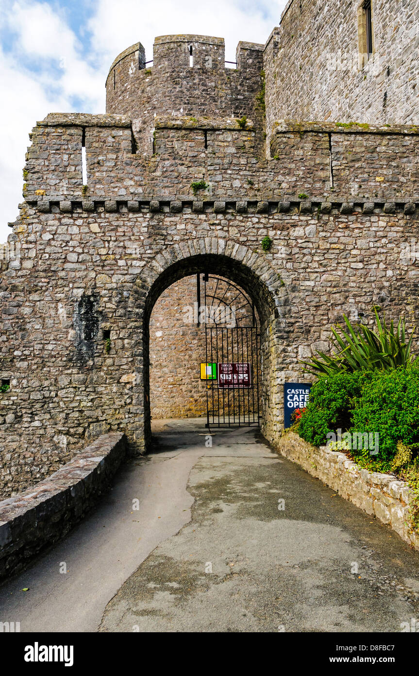 The barbican and one of the two round towers of the gatehouse defending ...