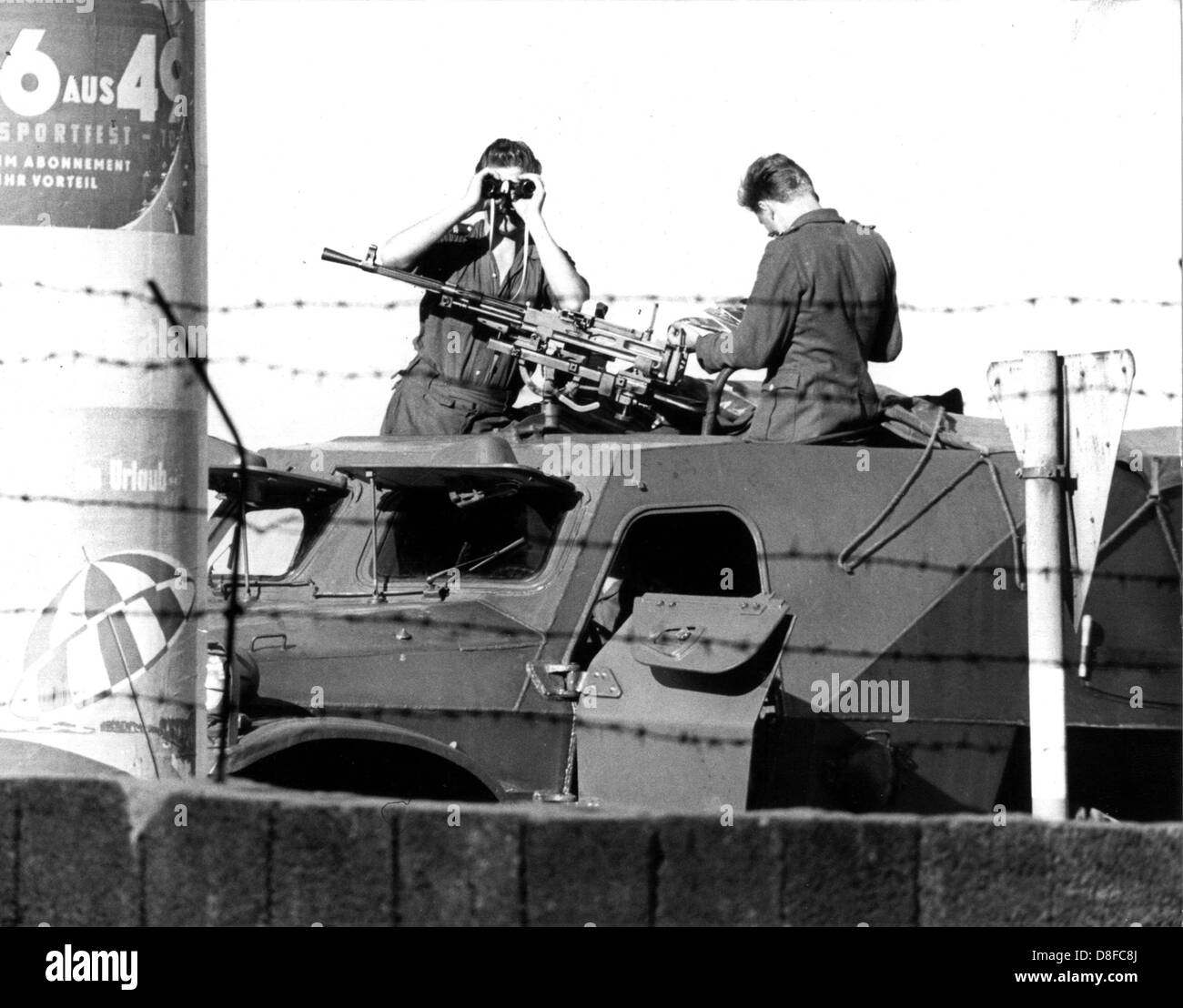 GDR police forces monitor the border at Friedrich Street in Berlin ...