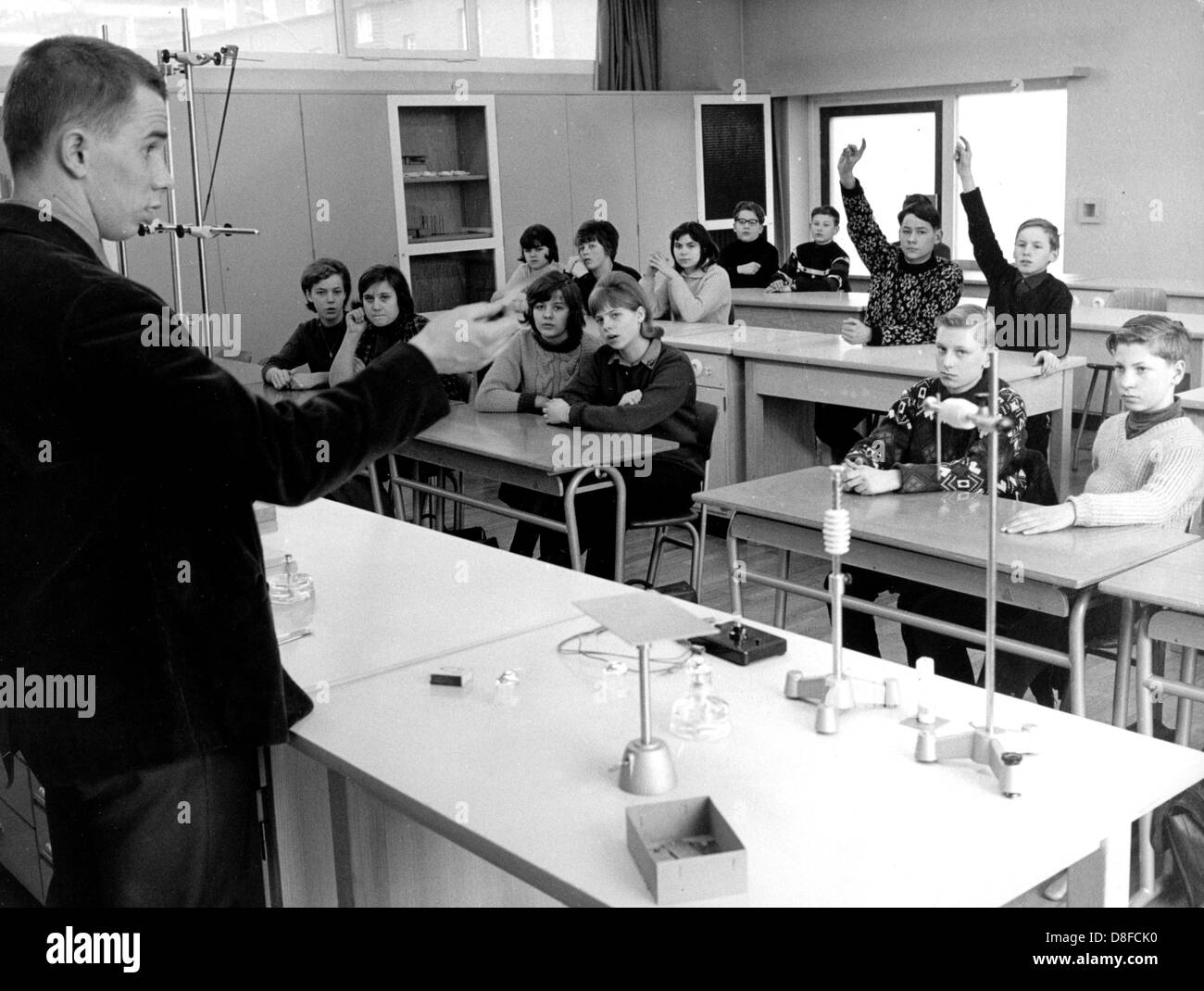 Pupils of the 8th class during the physics lesson in a public ...