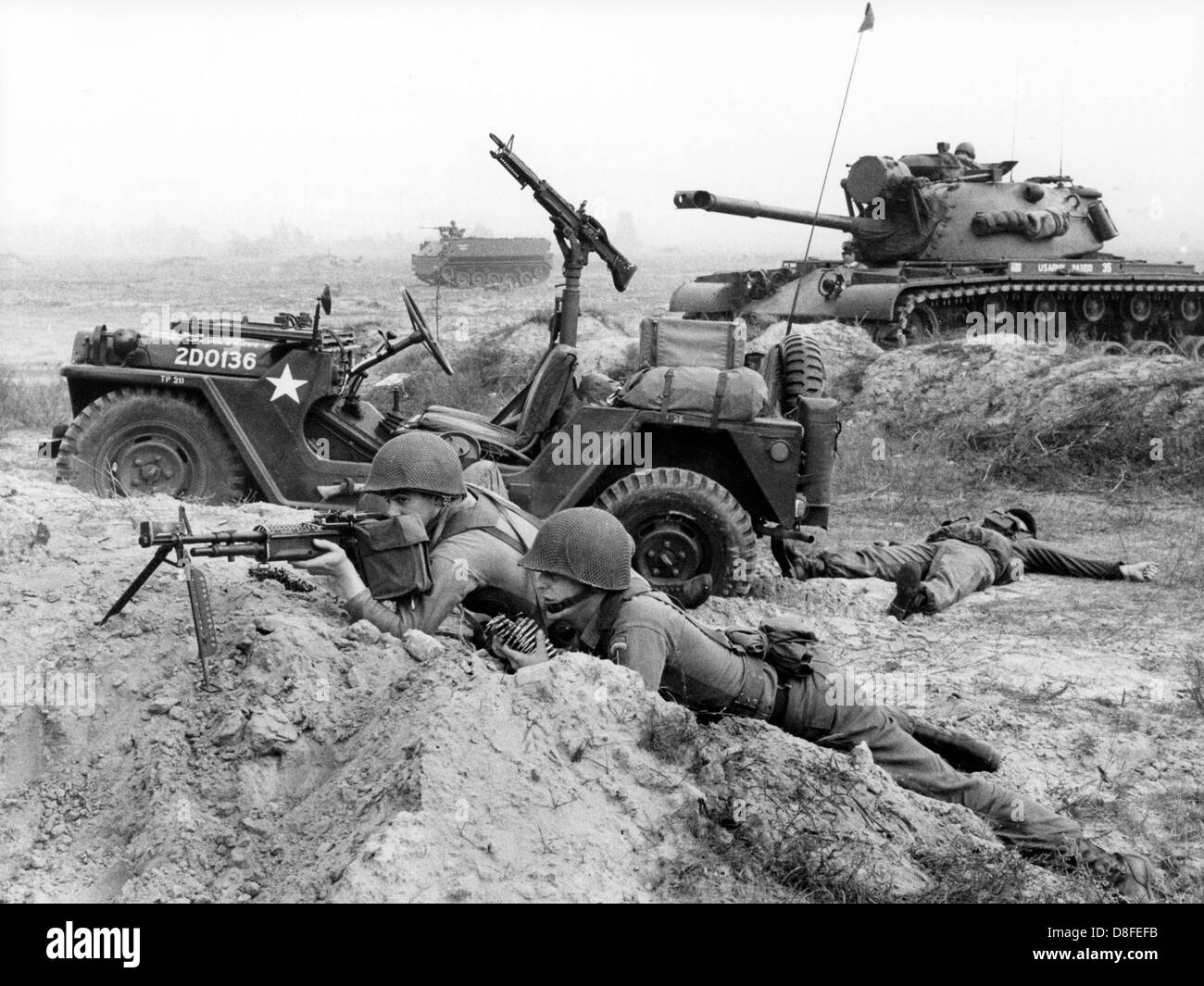 Soldiers and military vehicles of the US army during an exercise on the ...