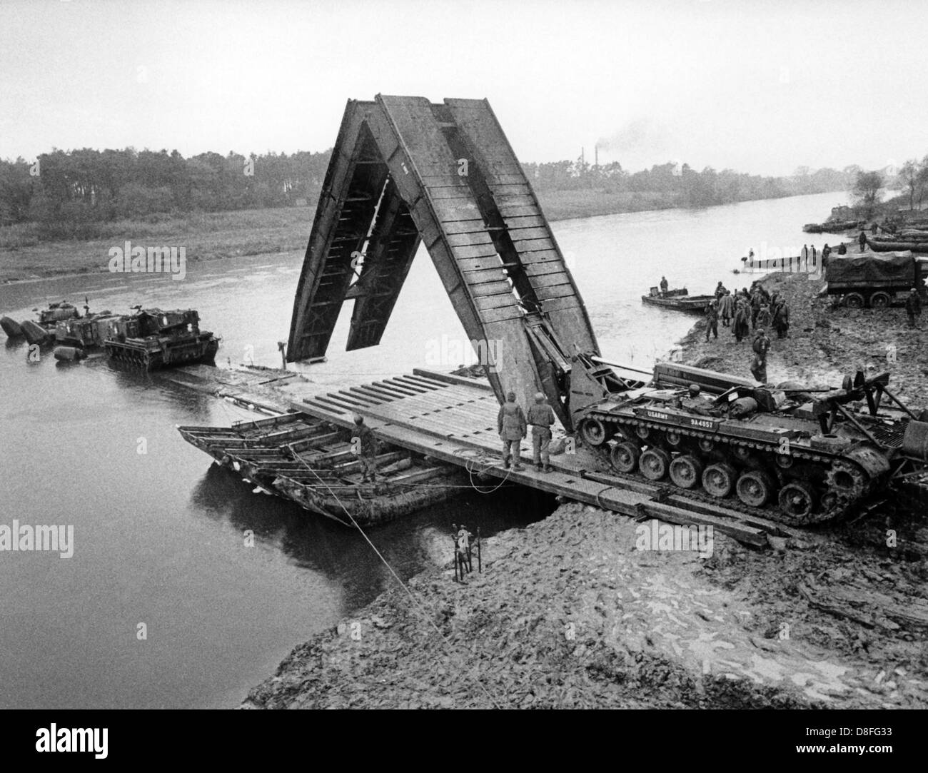 A hydraulically extendable military bridge of 60 tons weight is ...