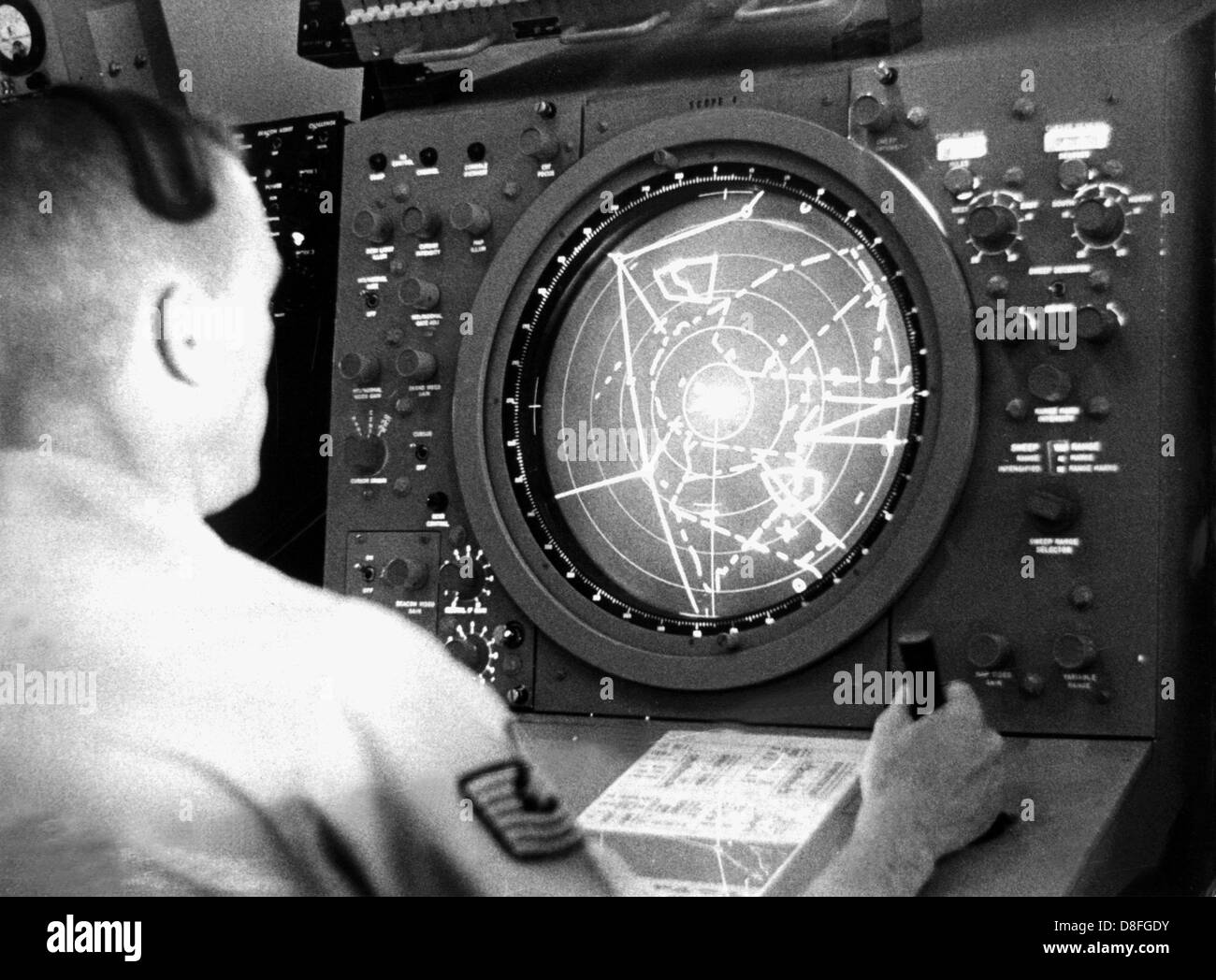 An American flight controller at the radar control system of the ...