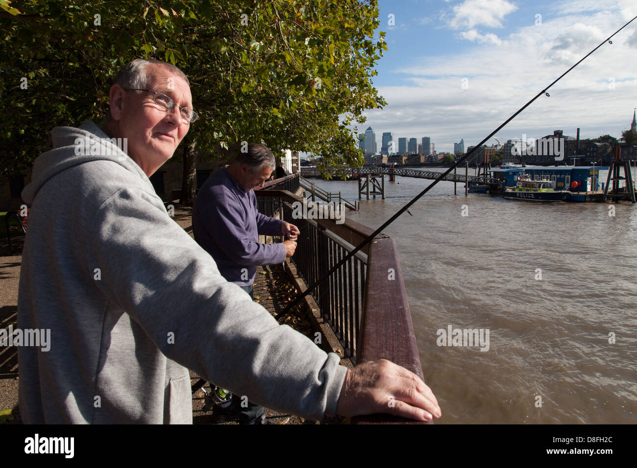 Two men eel fishing in River Thames, London Stock Photo - Alamy