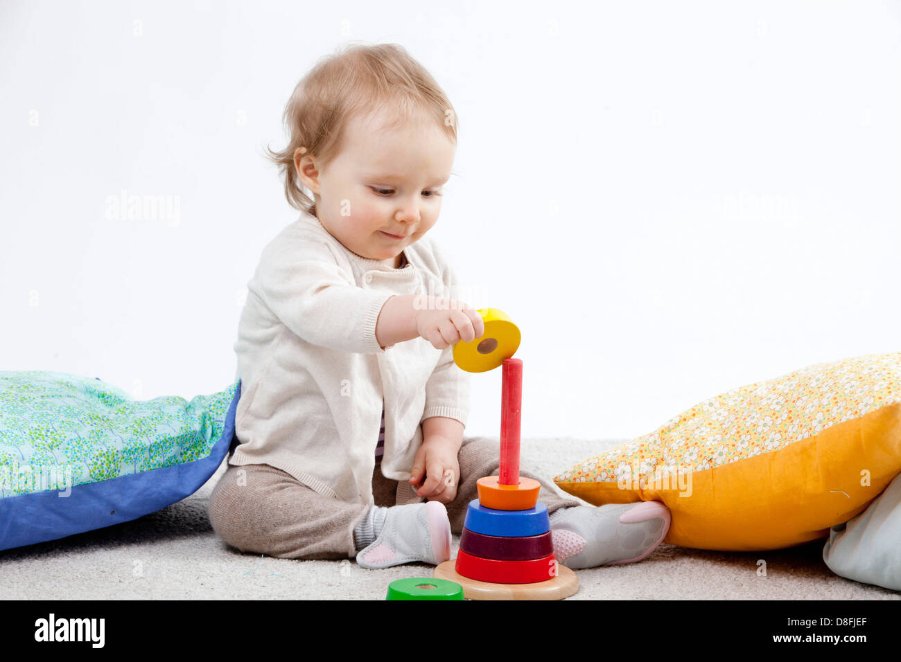 INFANT PLAYING INDOORS Stock Photo - Alamy