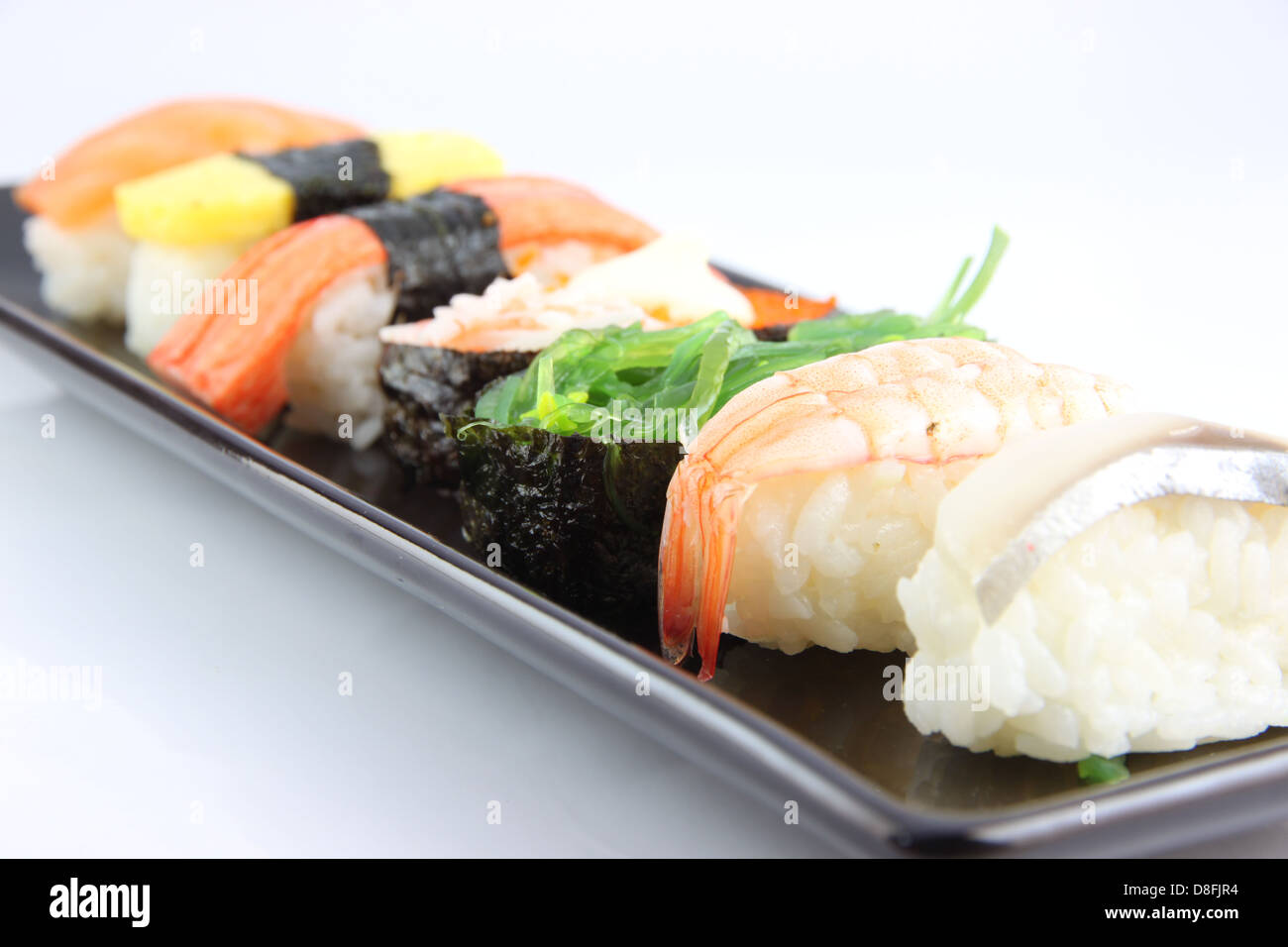Sushi made from seafood on Black dish,Sushi is a food of Japanese Stock ...