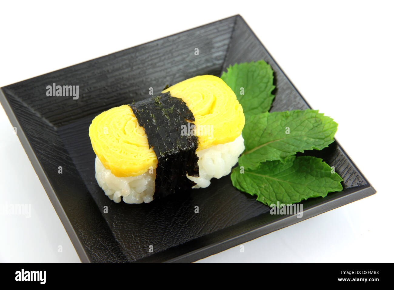 Sushi made from egg on dish,Sushi is a food of Japanese Stock Photo - Alamy