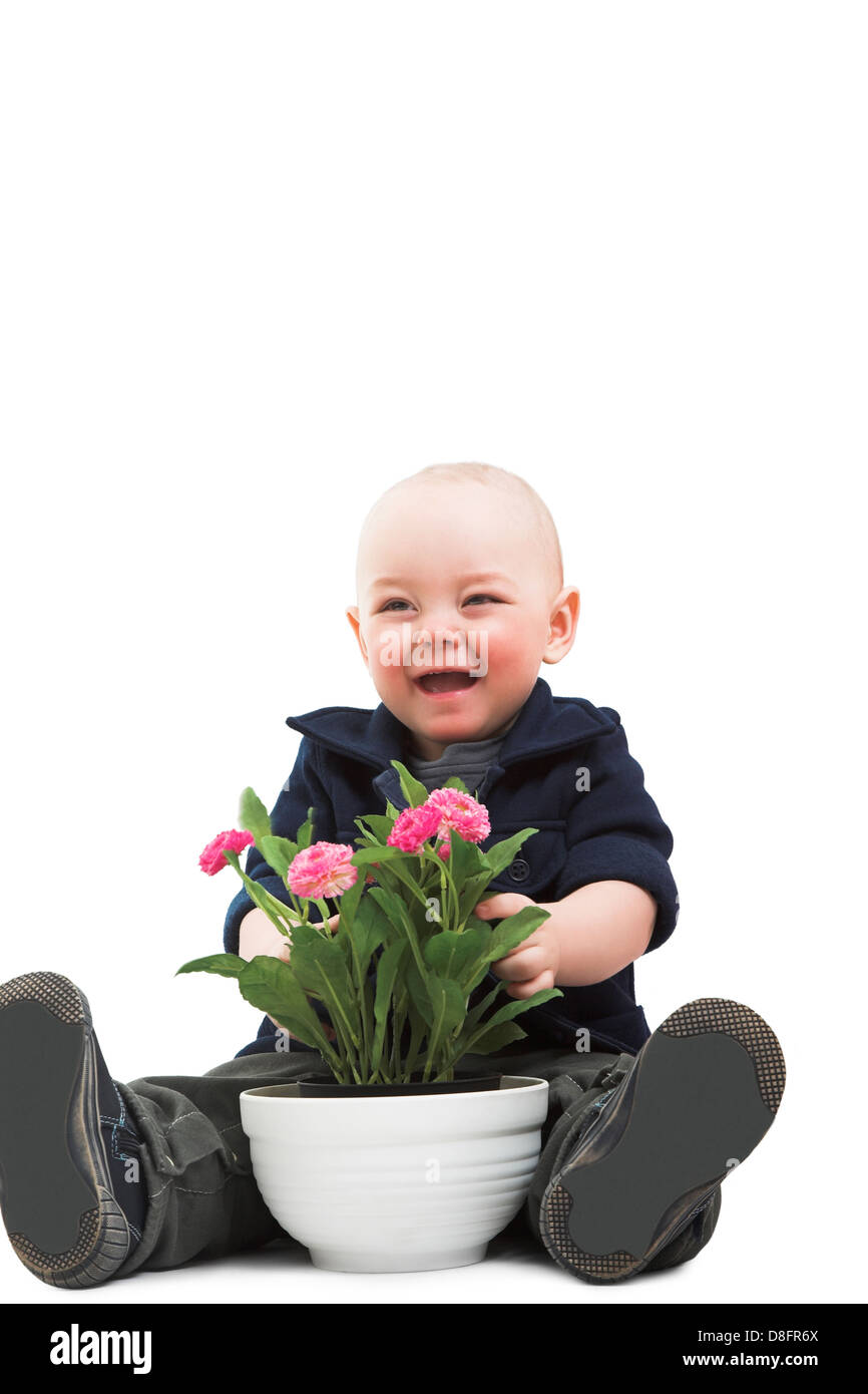 boy with house plant Stock Photo - Alamy