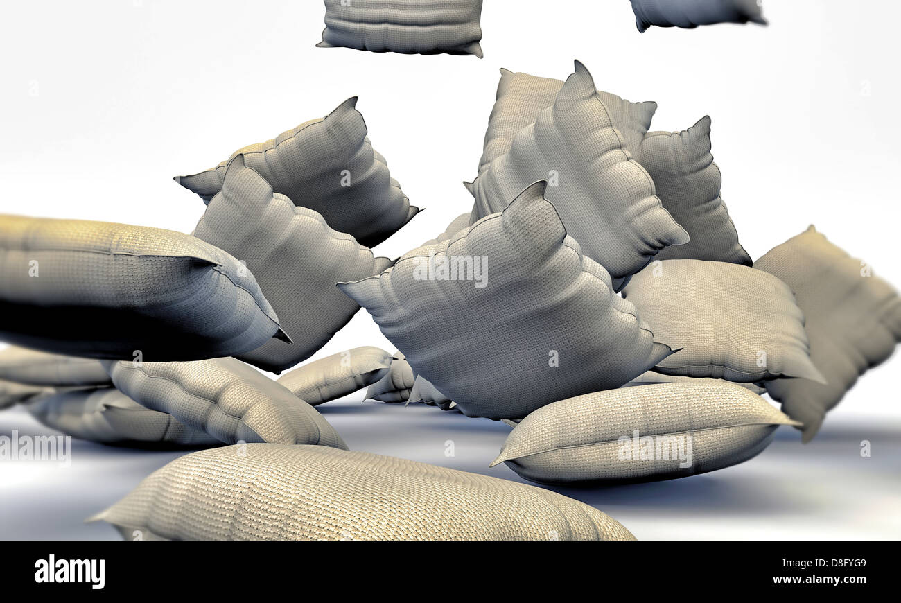 pillows falling isolated on white background Stock Photo - Alamy