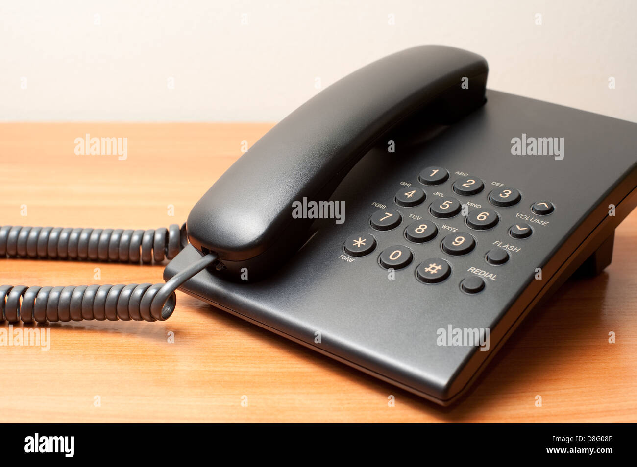 Phone on a table Stock Photo - Alamy