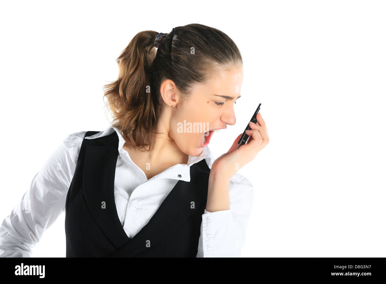 A woman shouting at a mobile phone Stock Photo - Alamy