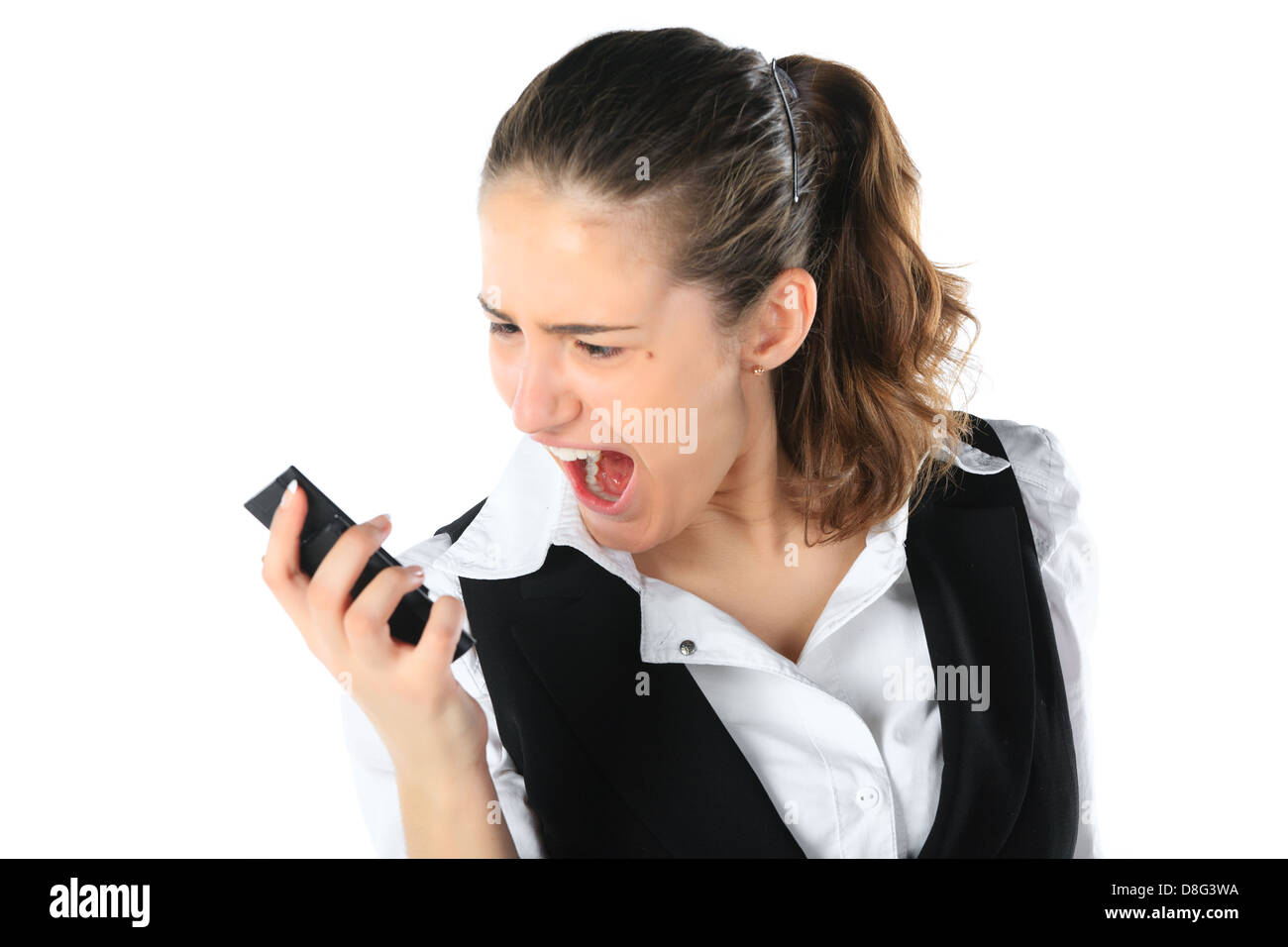 A woman shouting at a mobile phone Stock Photo - Alamy