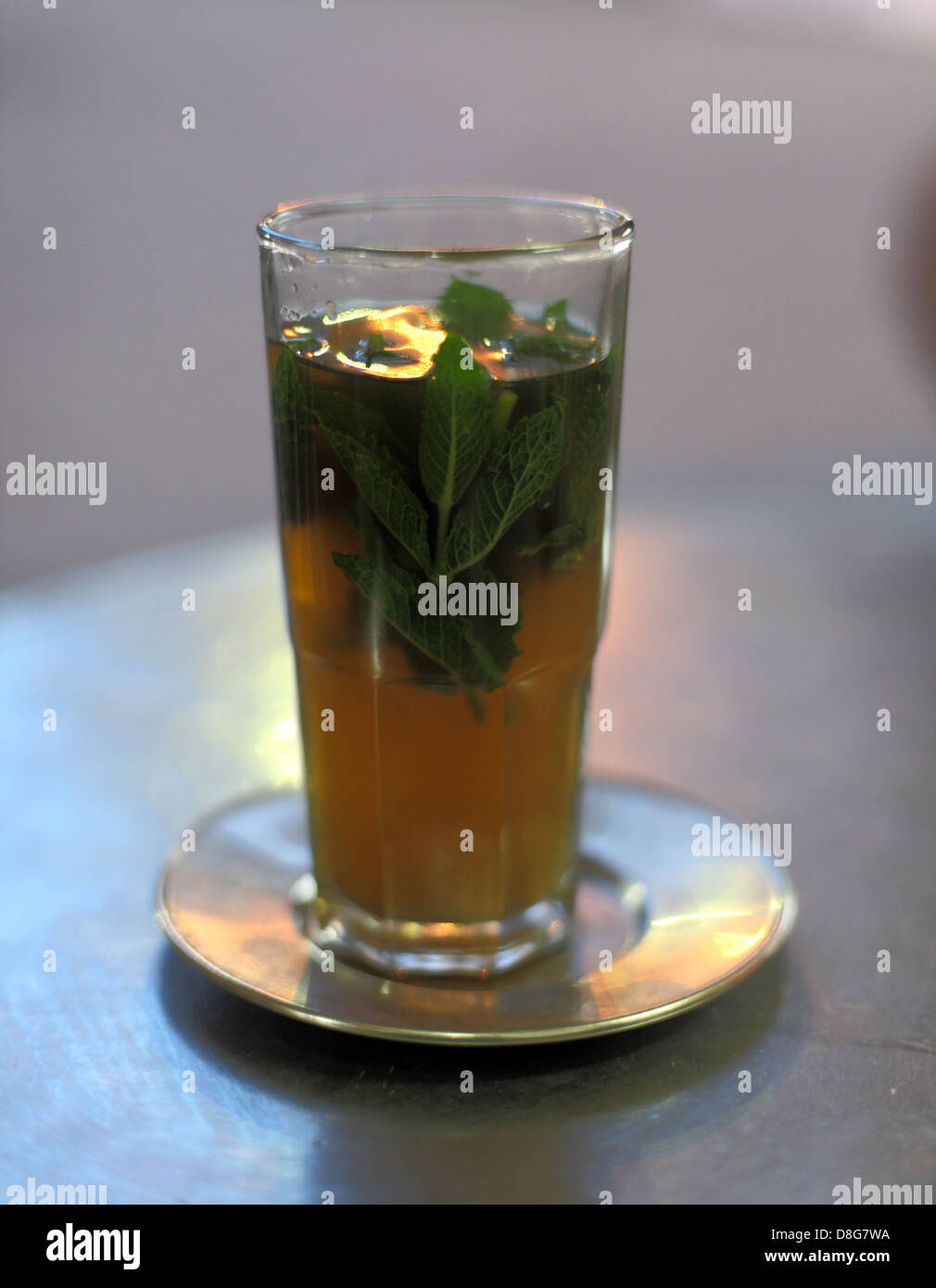 Traditional moroccan mint tea as served in a cafe in Tangier, Morocco ...