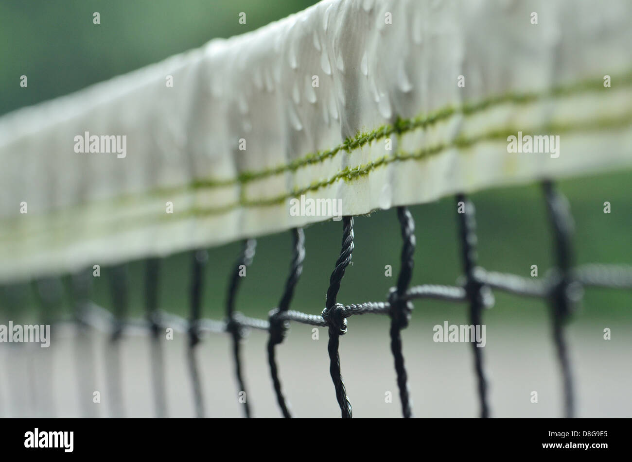 tennis net on a wet day Stock Photo - Alamy