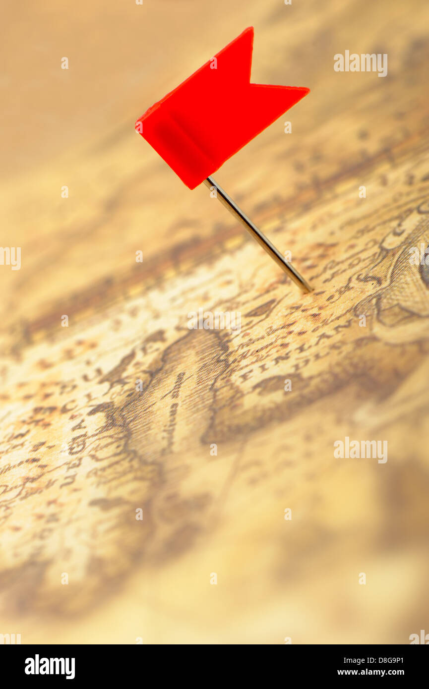 Flag red a pin on old map Stock Photo - Alamy